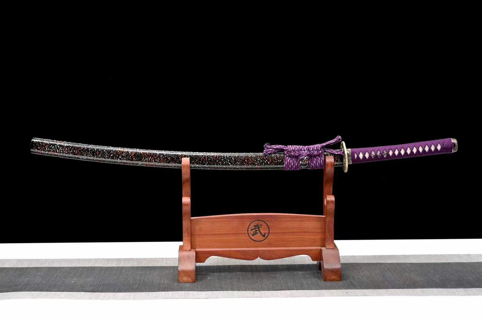 A samurai sword with blued twisted patterns.