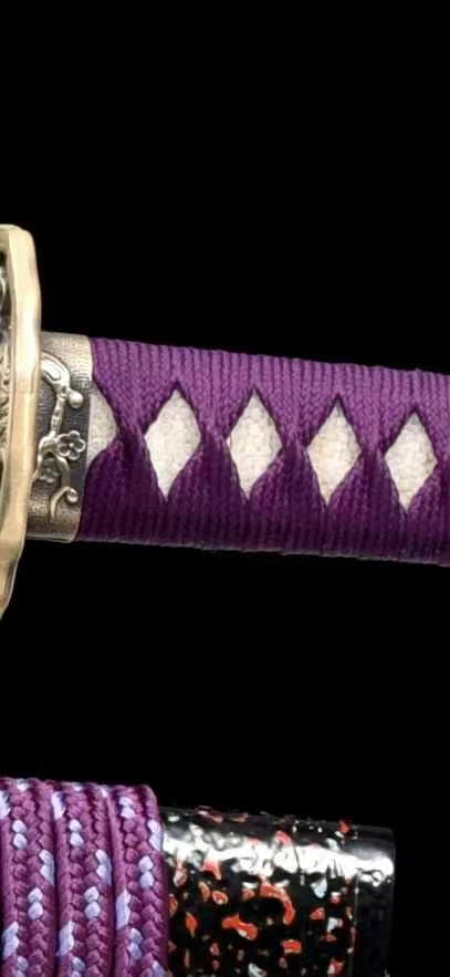 A samurai sword with blued twisted patterns.
