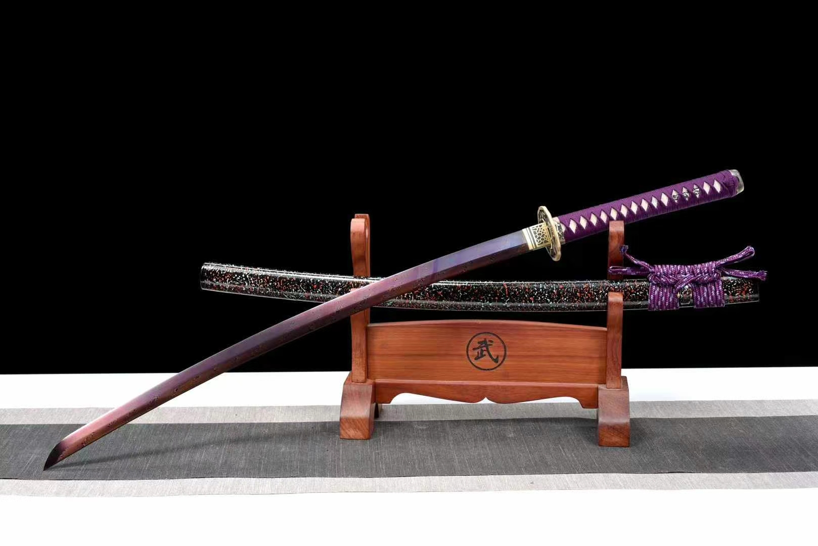 A samurai sword with blued twisted patterns.